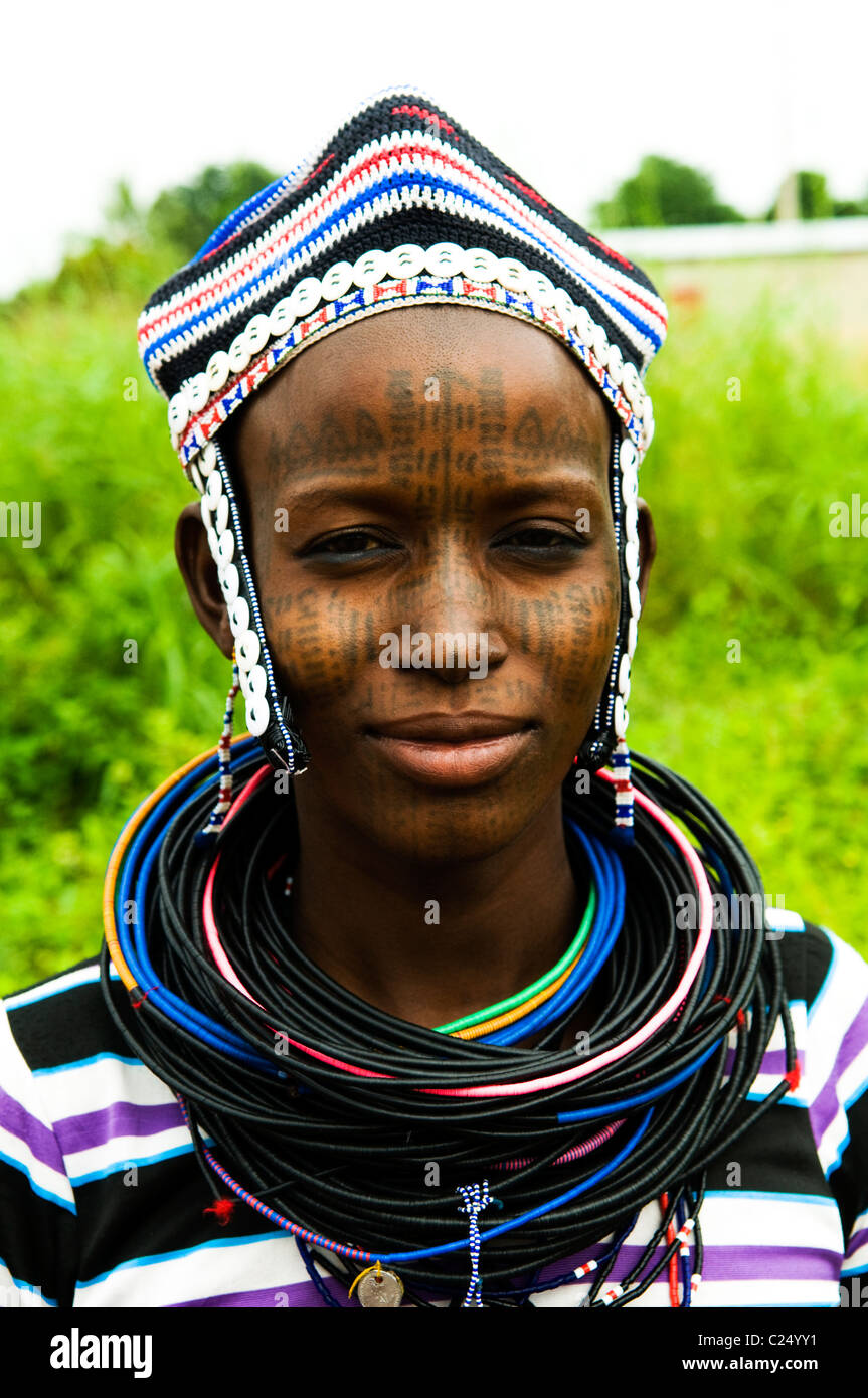 Portrait of a beautiful Peul woman taken in north Benin near the border ...