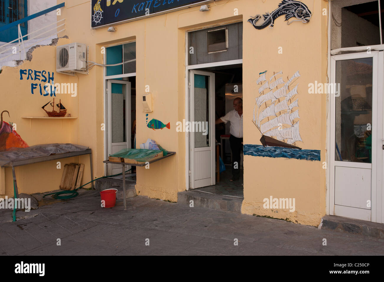 A colourful fish shop in the city of Koroni; Messinia, Peloponnese ...