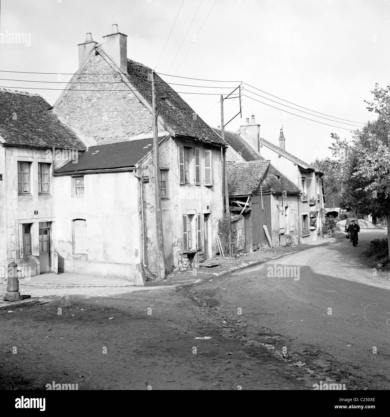Village 1950s rural houses housing buildings black white street hi-res ...