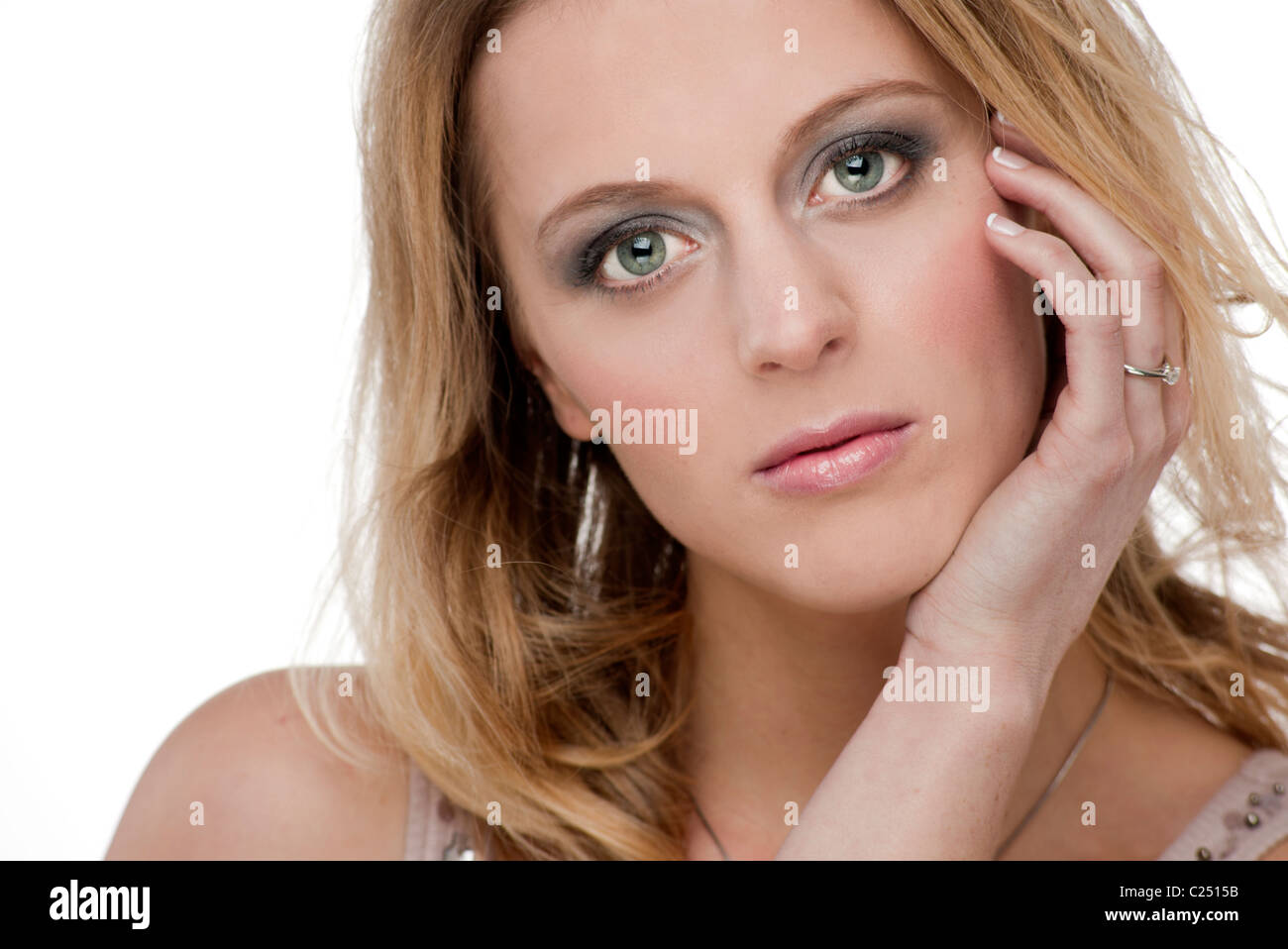 Blonde woman staring into the camera lens Stock Photo - Alamy