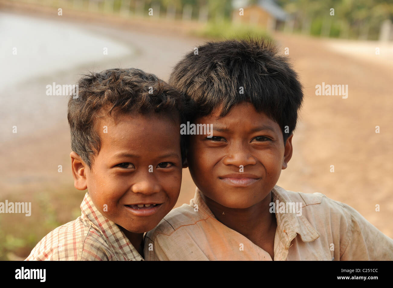 Happy dad carries serious podgy cute son Stock Photo - Alamy