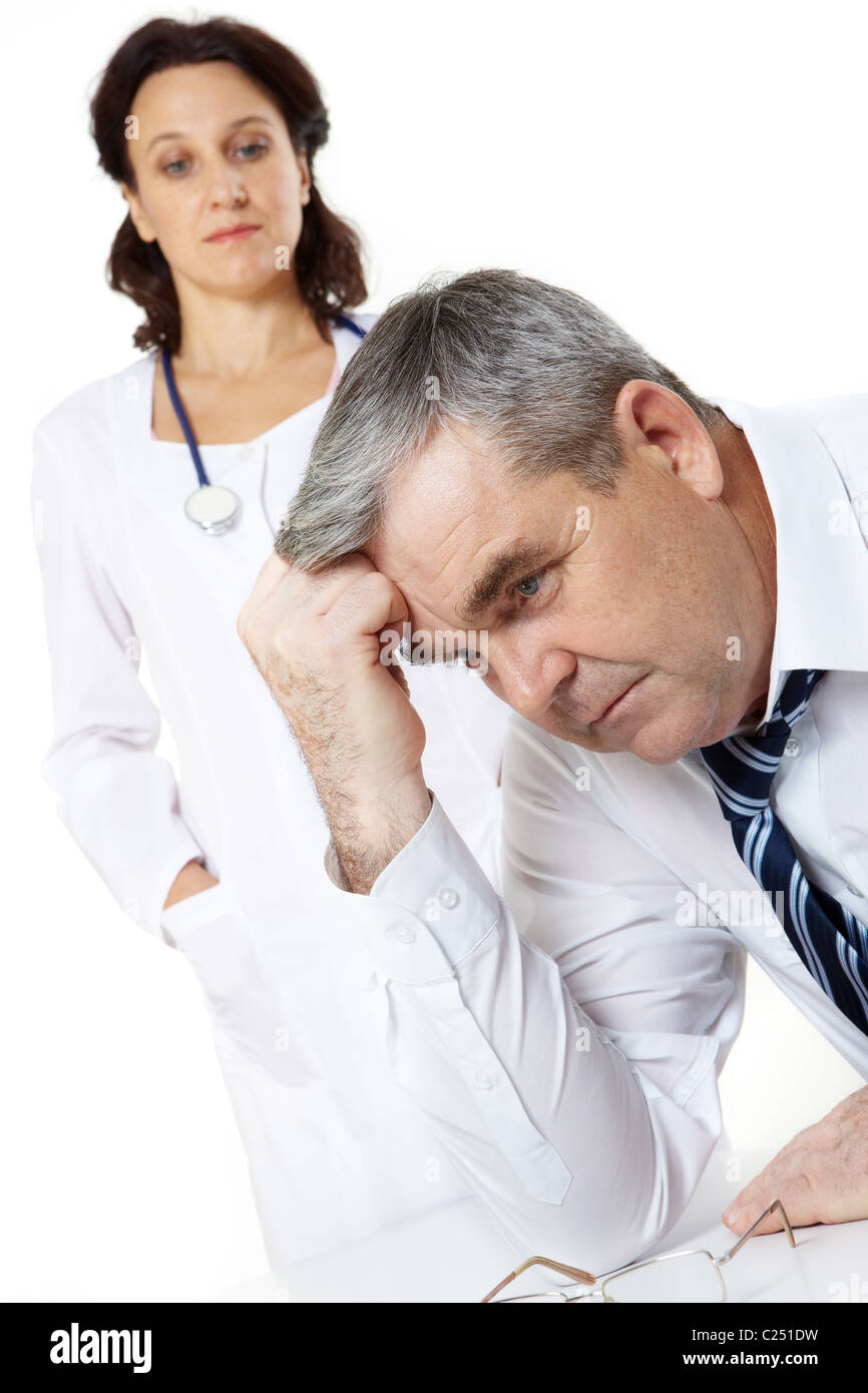 Man headache consulting female doctor hi-res stock photography and ...