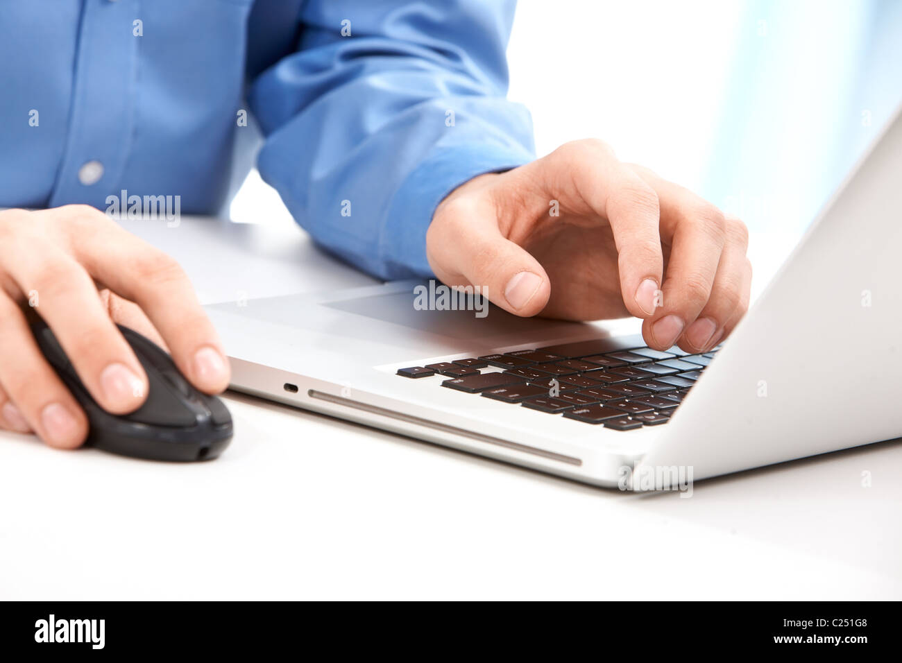 Male hands over keyboard laptop hi-res stock photography and images - Alamy