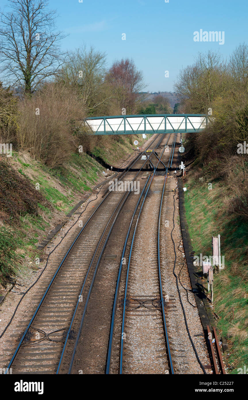 Bridge over railway track running through Dorking, Surrey, England UK ...