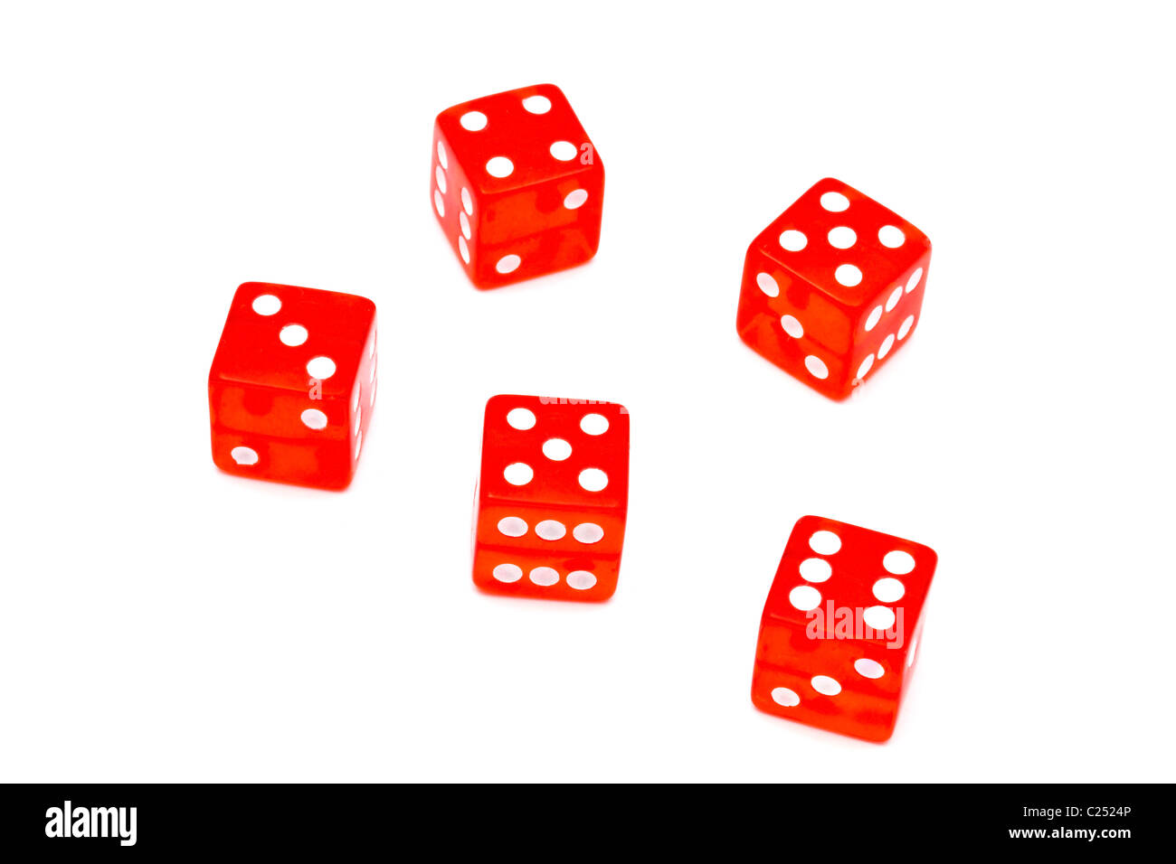 Red dice isolated on white background Stock Photo - Alamy