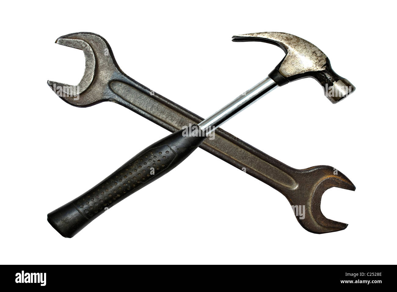 Hammer and wrench isolated on white background Stock Photo - Alamy