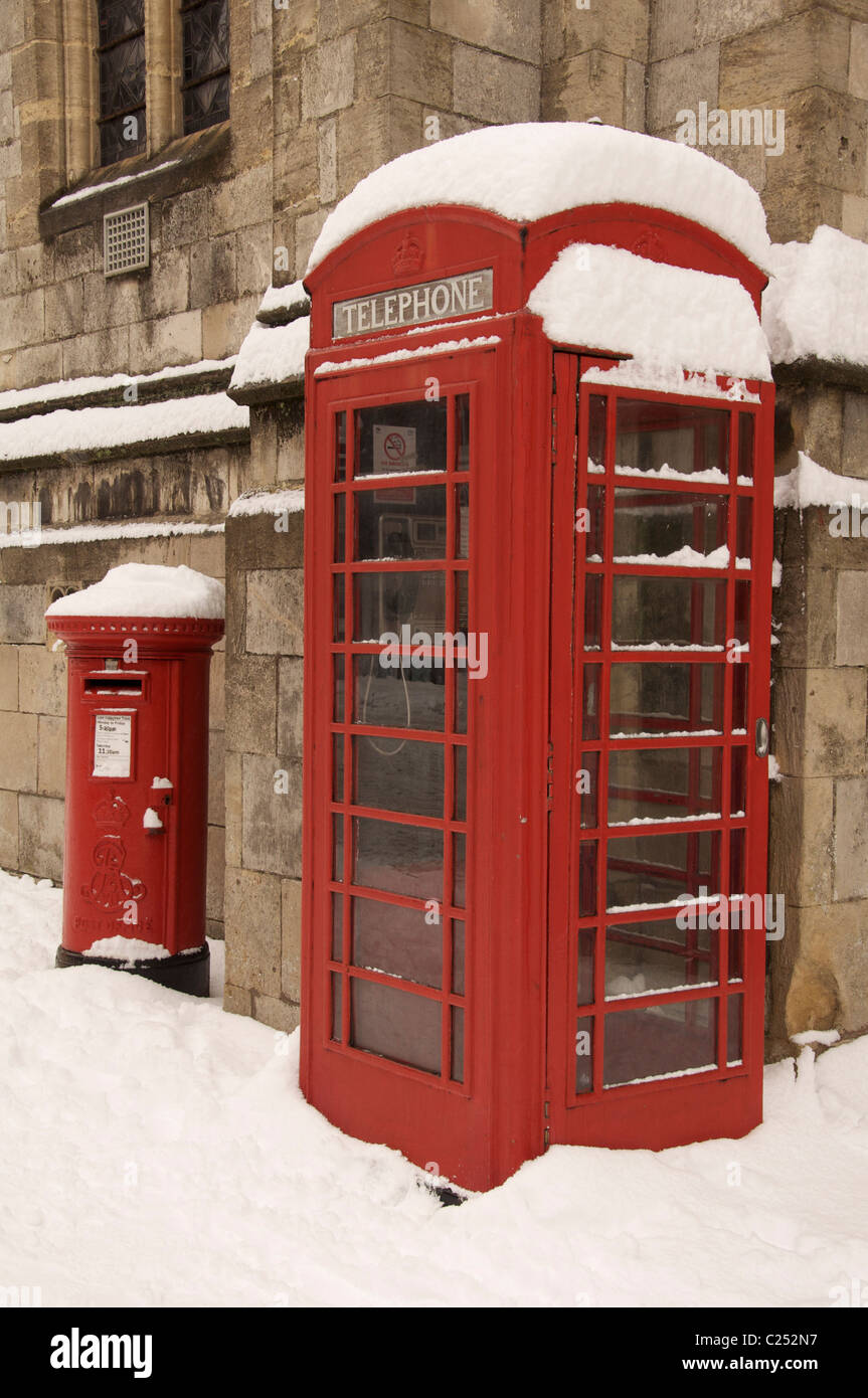 An iconic British red telephone kiosk and a pillar box, standing ...