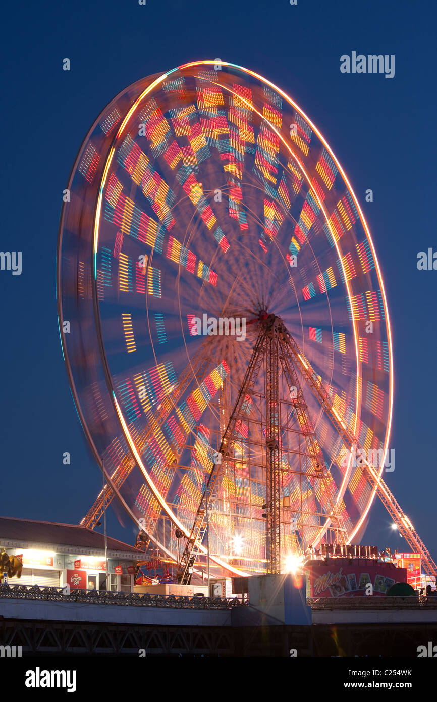 The ferris wheel on the pier at Blackpool Beach in Lancashire, England ...