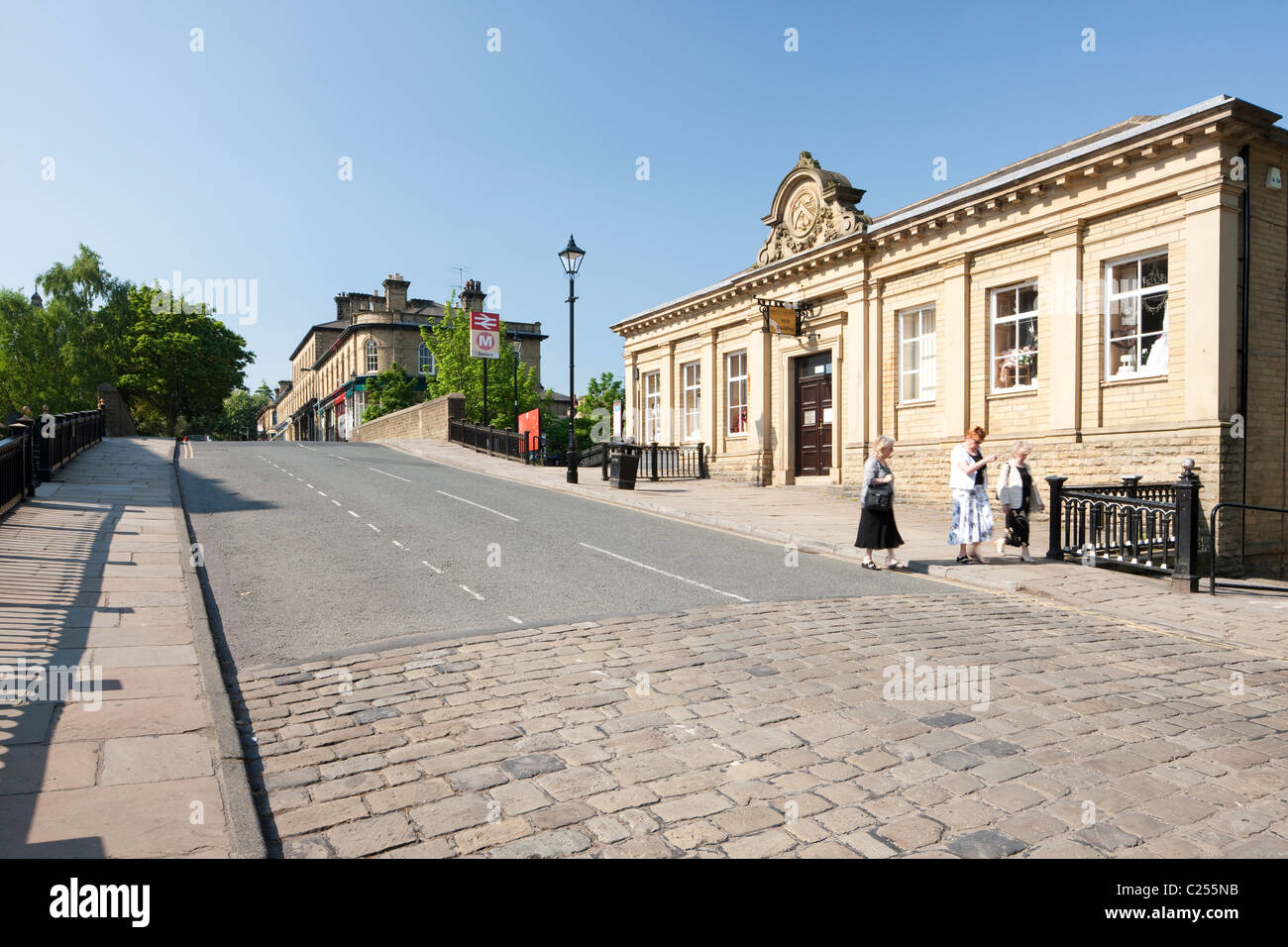 The railway station looking up Victoria Road in Saltaire, Yorkshire, UK ...