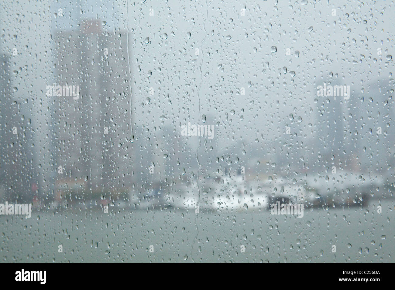 New York skyscrapers seen through rain-spattered window Stock Photo - Alamy