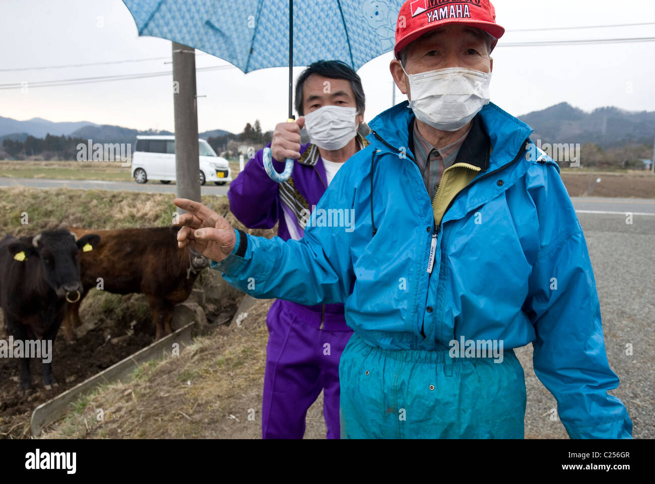 Farmer Sachio Yamamoto (r), and former nuclear power plant worker Yuji ...