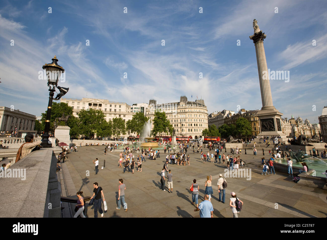 Trafalgar square london blue sky clouds people hi-res stock photography ...