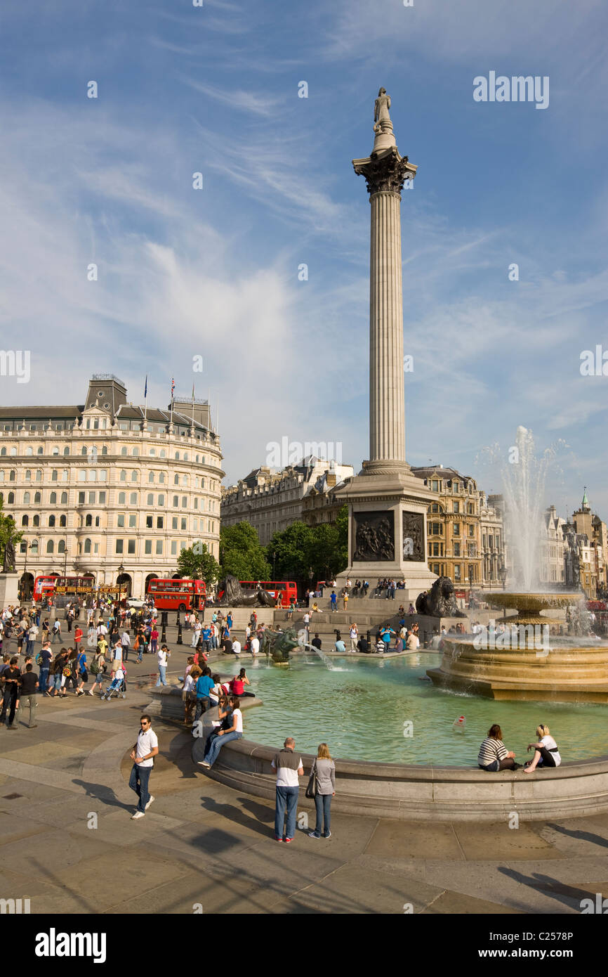 Trafalgar square london blue sky clouds people hi-res stock photography ...