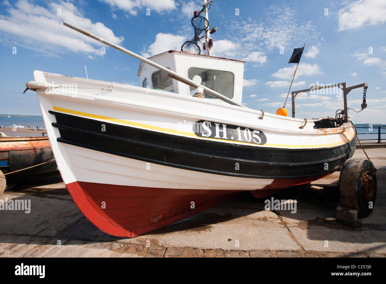 Fishing boats on the slipway to the beach at Filey, East Yorkshire ...