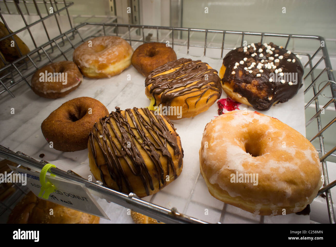 Assorted donuts are seen in a supermarket bakery department in New York ...