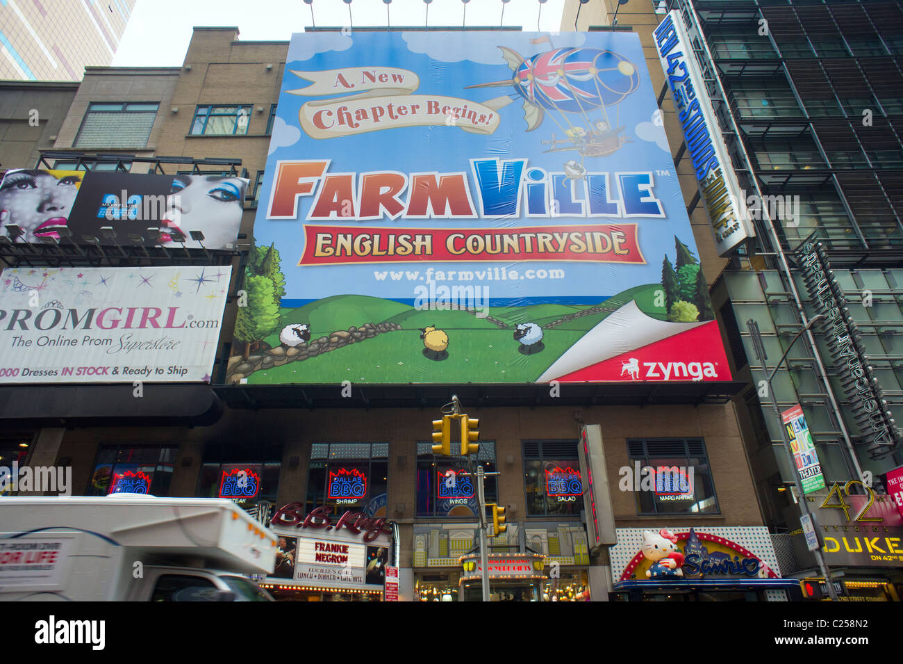A billboard in Times Square advertising the popular FarmVille game on ...