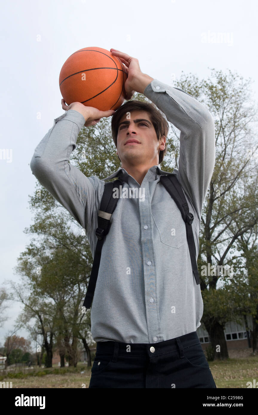 University student with basketball on campus Stock Photo - Alamy