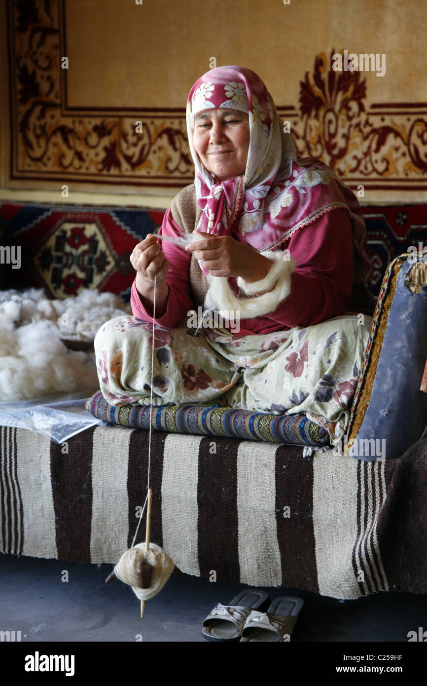 TURKISH WEAVER SPINS THE COTTON FOR KILIM RUGS FETHIYE TURKEY 15 ...