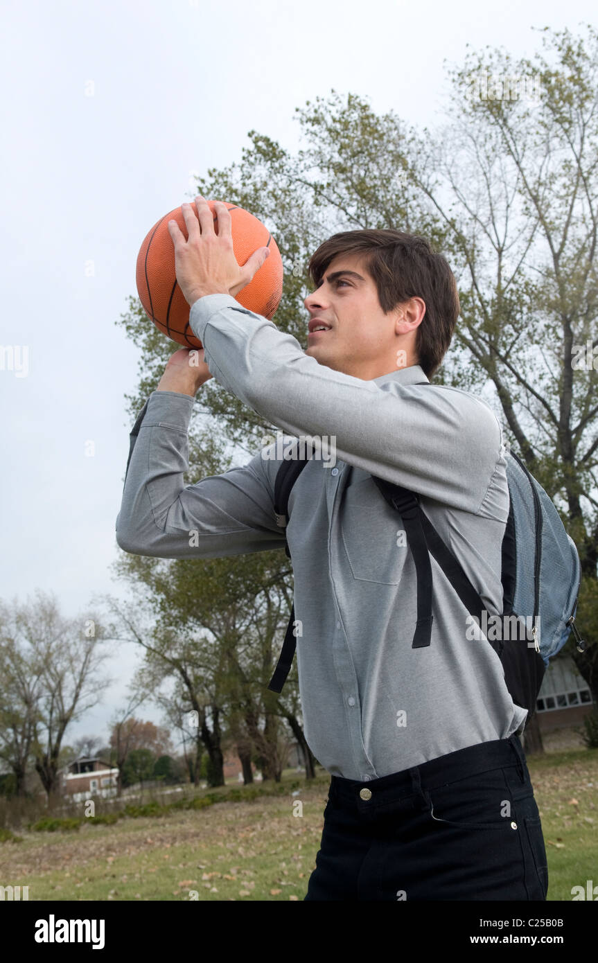 University student with basketball on campus Stock Photo - Alamy