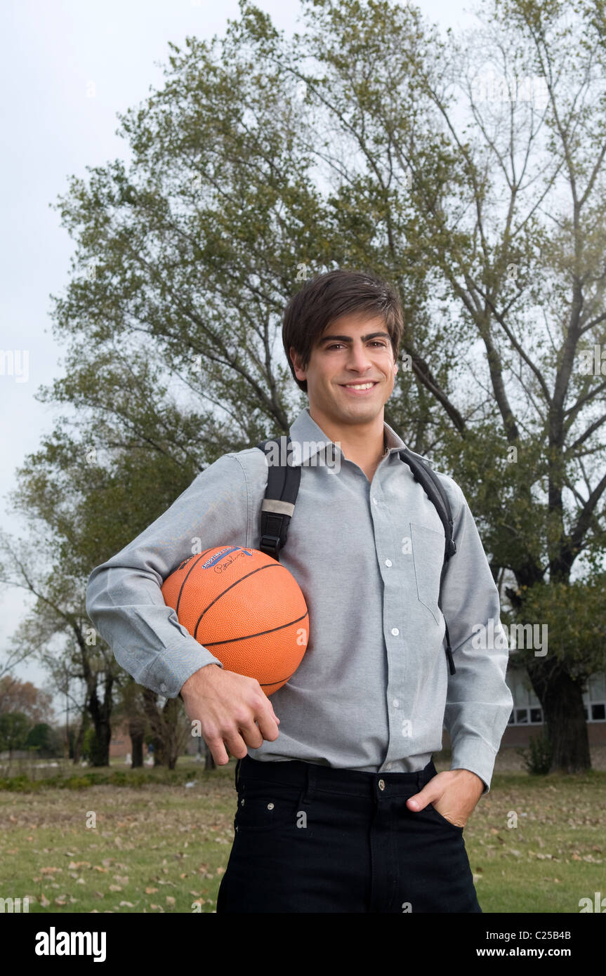 University student with basketball on campus Stock Photo - Alamy