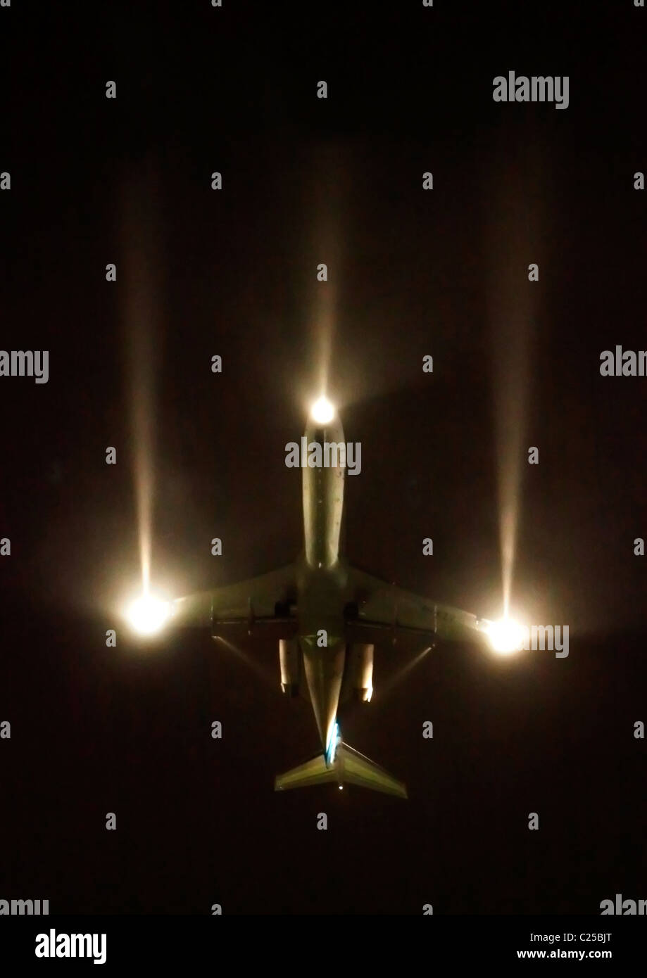 Jet Air liner at night Stock Photo - Alamy