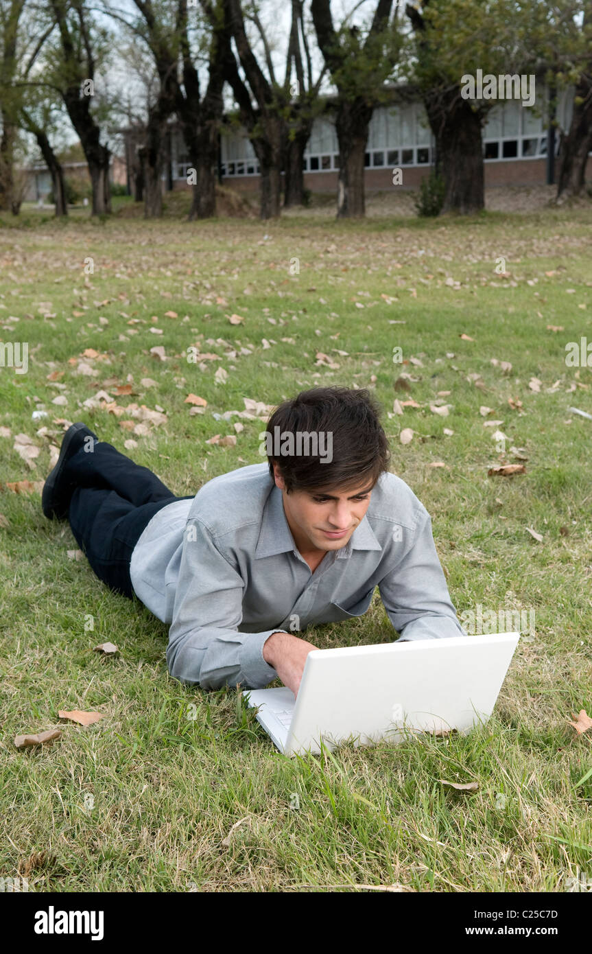 Guy, boy, man, lay, laying, down, on, a, the, field, campus, outdoor ...