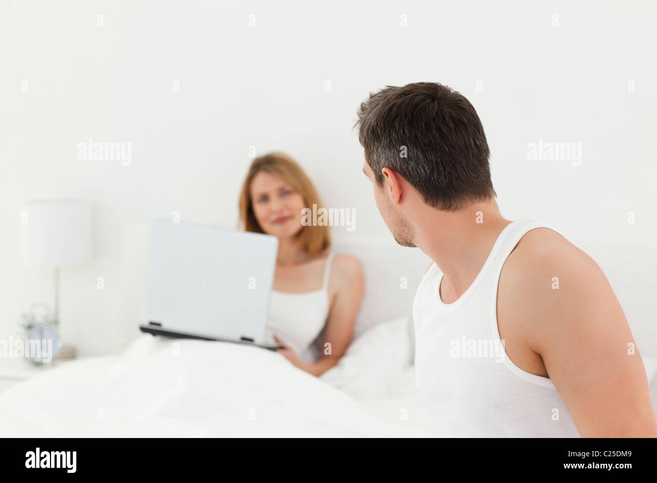 Man talking with his girlfriend Stock Photo - Alamy