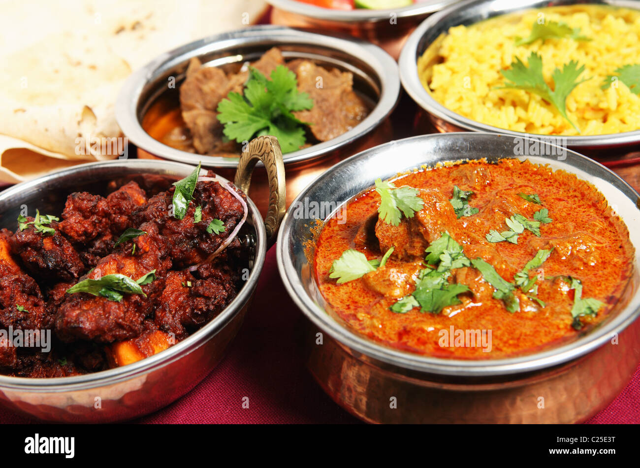 Chicken fry (left) and Kashmiri lamb curry (right) in front of ...
