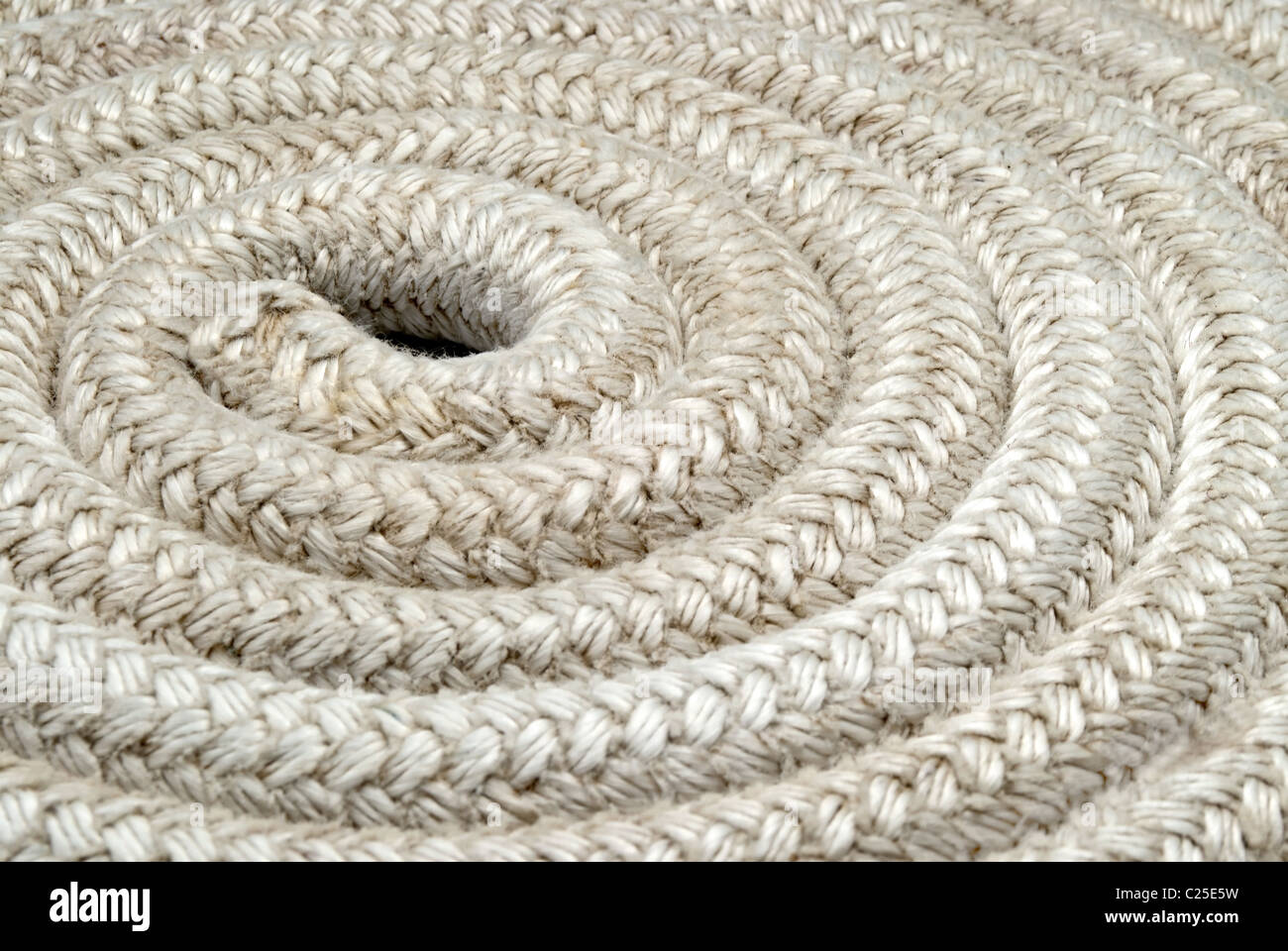 Old nautical rope - Closeup Detail on a reel of twisted boat's rope ...