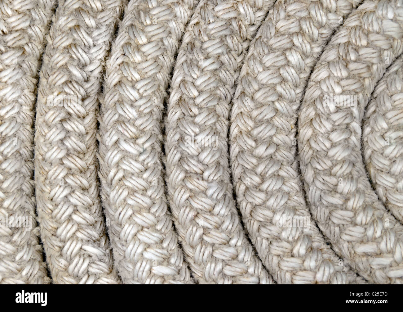 Old nautical rope - Closeup Detail on a reel of twisted boat's rope ...