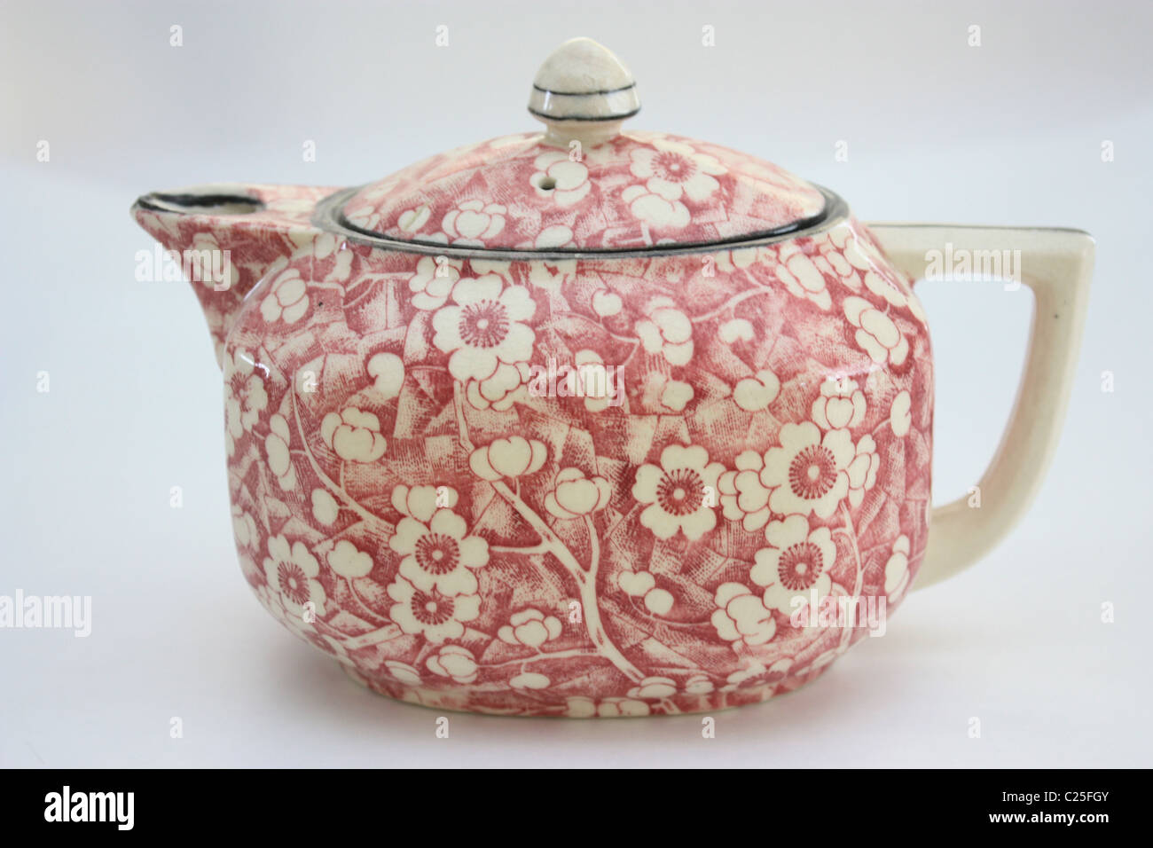 English patterned antique tea pot Stock Photo - Alamy