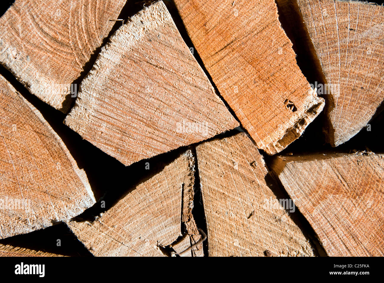 Pile of oak wooden logs stacked for firewood horizontal closeup Stock ...