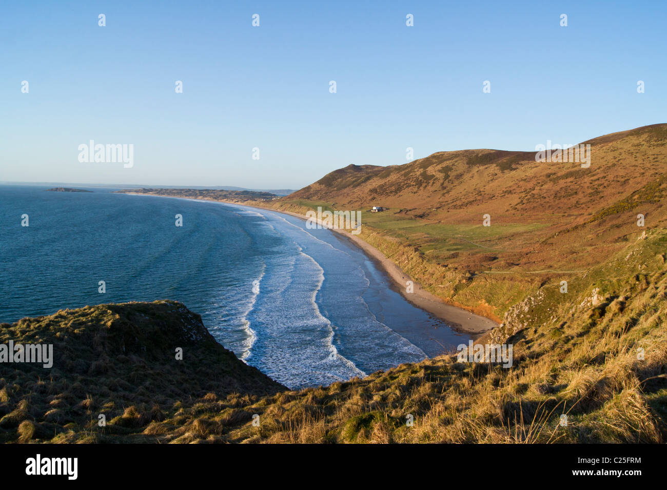 rhossili bay with the tide in Stock Photo - Alamy