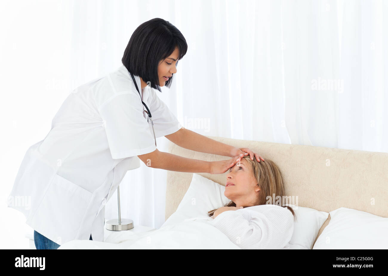 Taking temperature nurse hi-res stock photography and images - Alamy