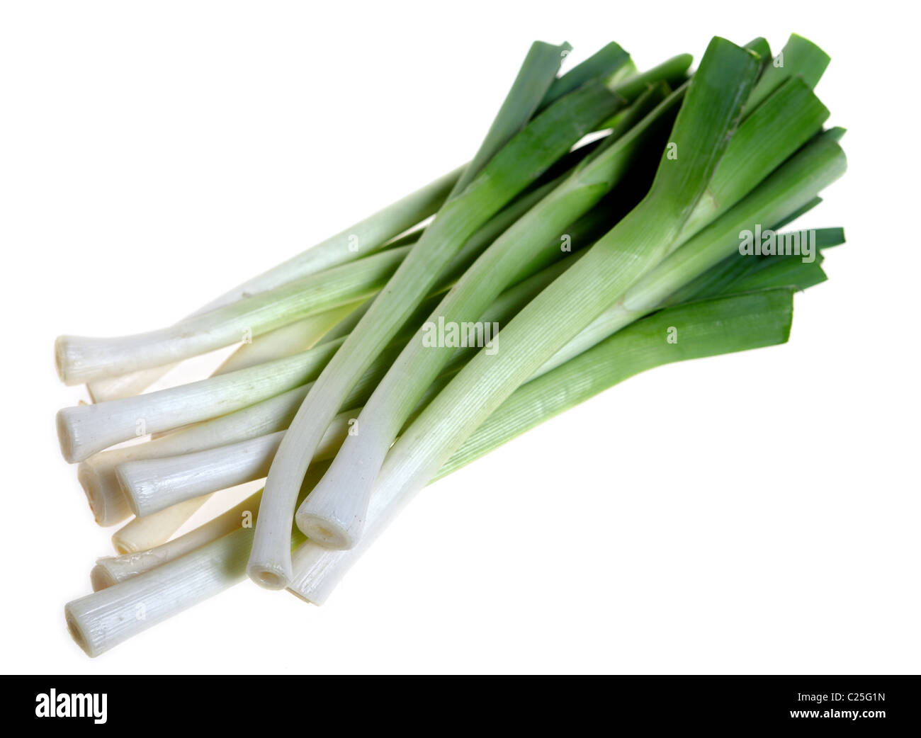 A bunch of fresh young leeks isolated on a white background Stock Photo ...