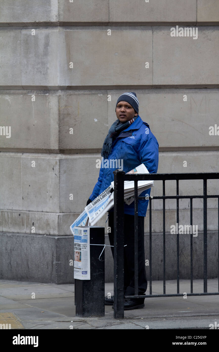 The newspaper vendor hi-res stock photography and images - Alamy