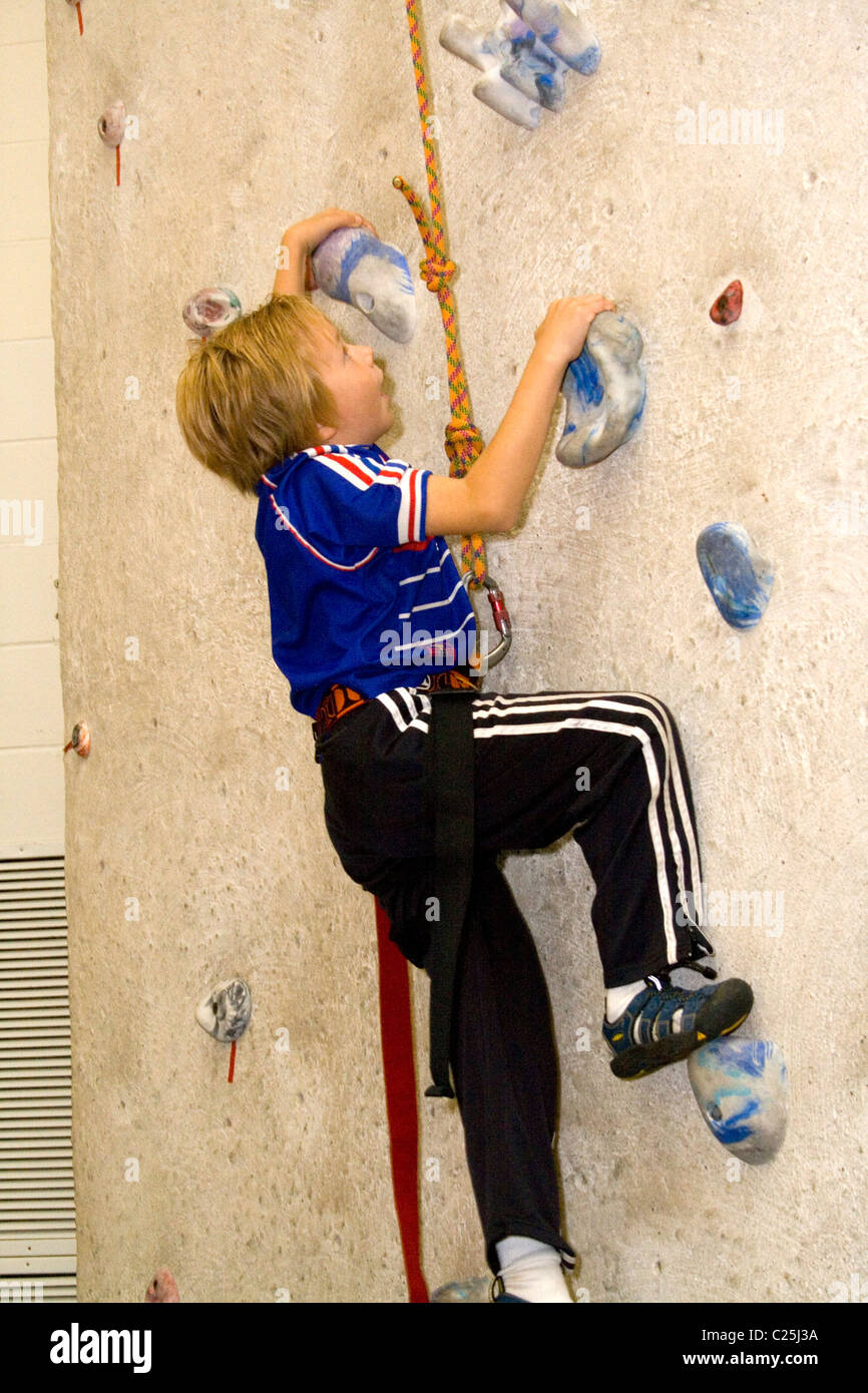 Boy age 7 climbing rock wall at Life Time Fitness. Eagan Minnesota MN ...