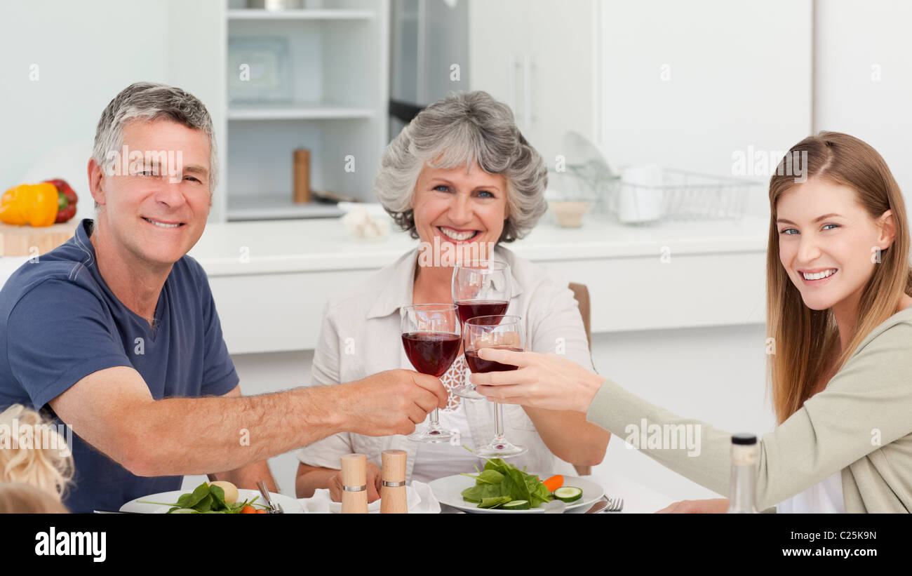 Family drinking wine together Stock Photo - Alamy
