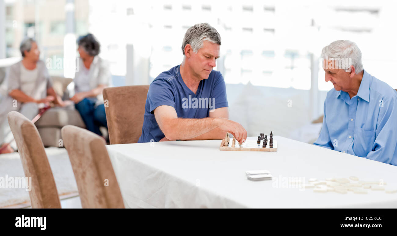 Seniors playing chess Stock Photo - Alamy