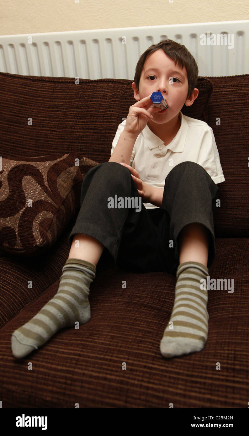 5 year old boy eating Smarties Stock Photo - Alamy