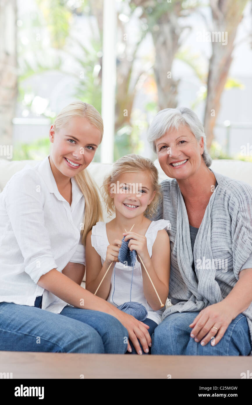 Beautiful family looking at the camera Stock Photo - Alamy