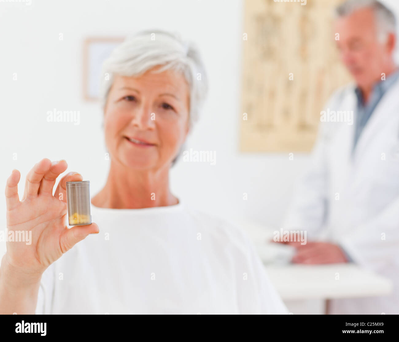 Patient with her pills Stock Photo - Alamy