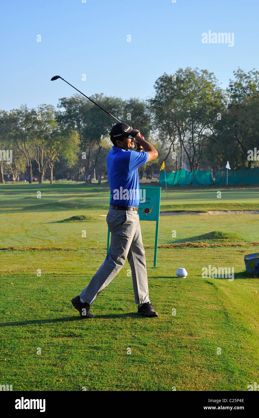 Golfer in driving mode Stock Photo - Alamy