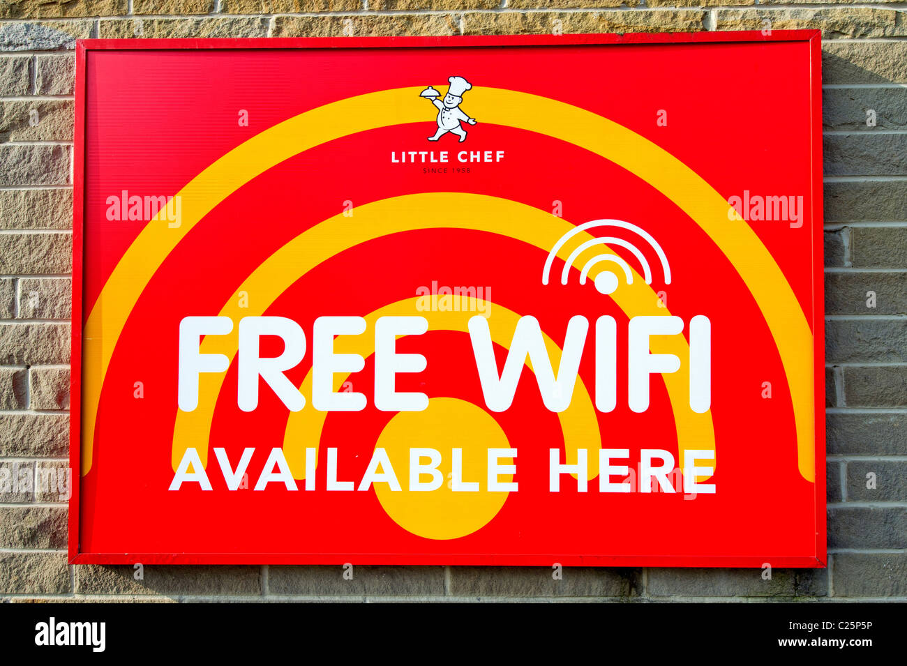 Free WiFi sign on the wall outside a Little Chef restaurant Stock Photo ...