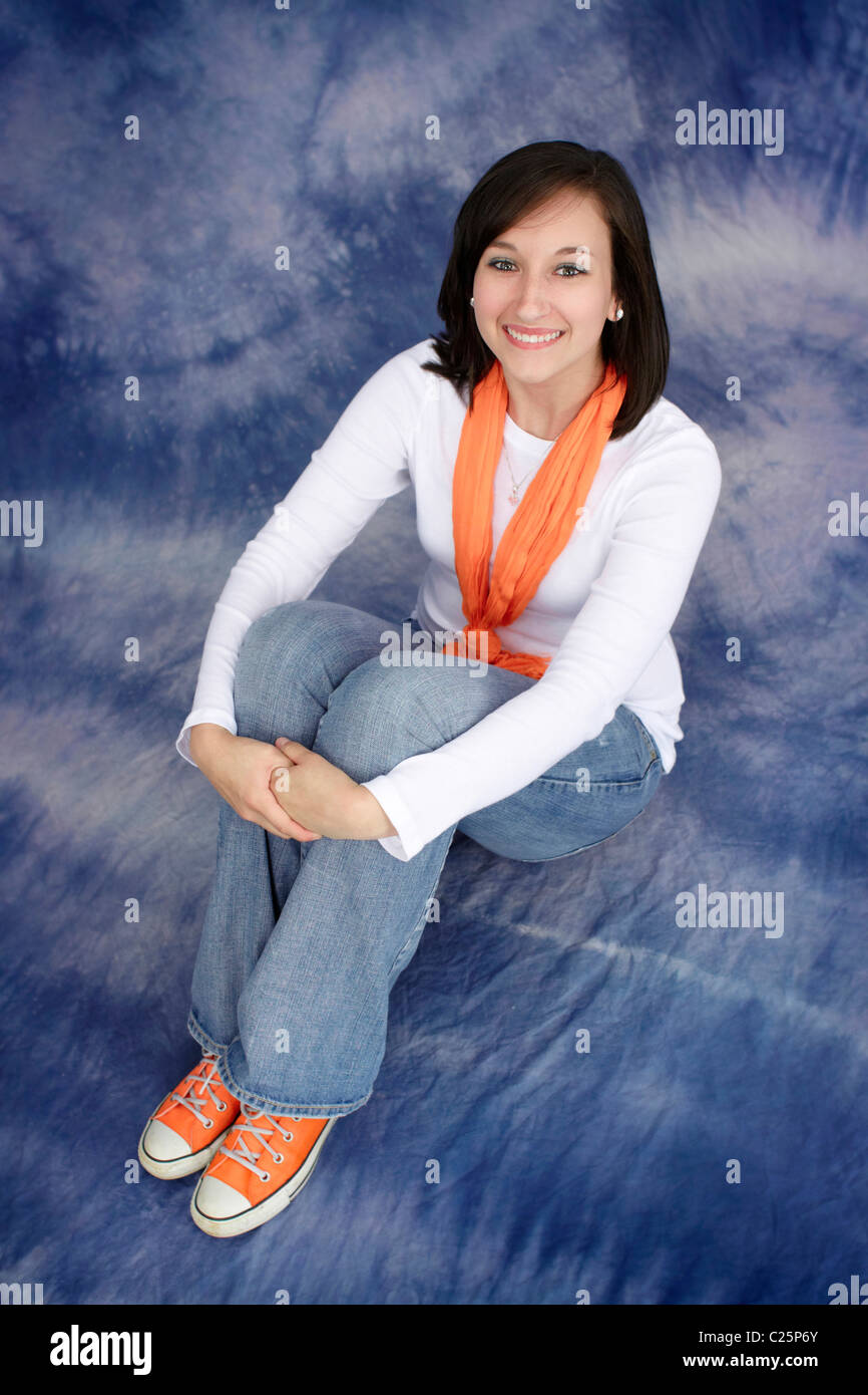 A young teenage girl with dark hair Stock Photo - Alamy