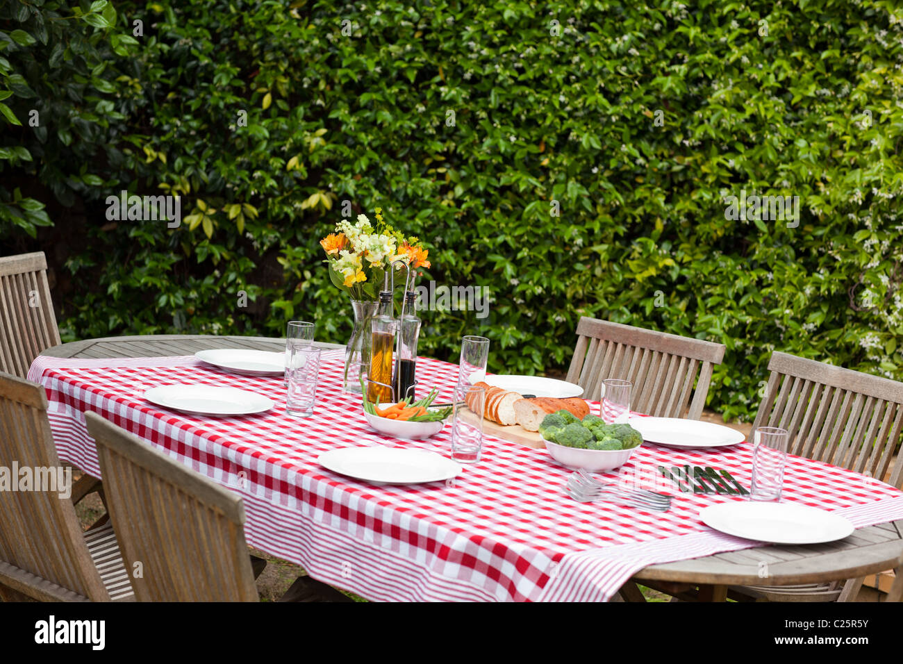 A lunch table in the garden Stock Photo - Alamy