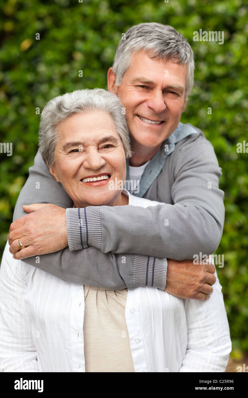 Mature couple hugging Stock Photo - Alamy