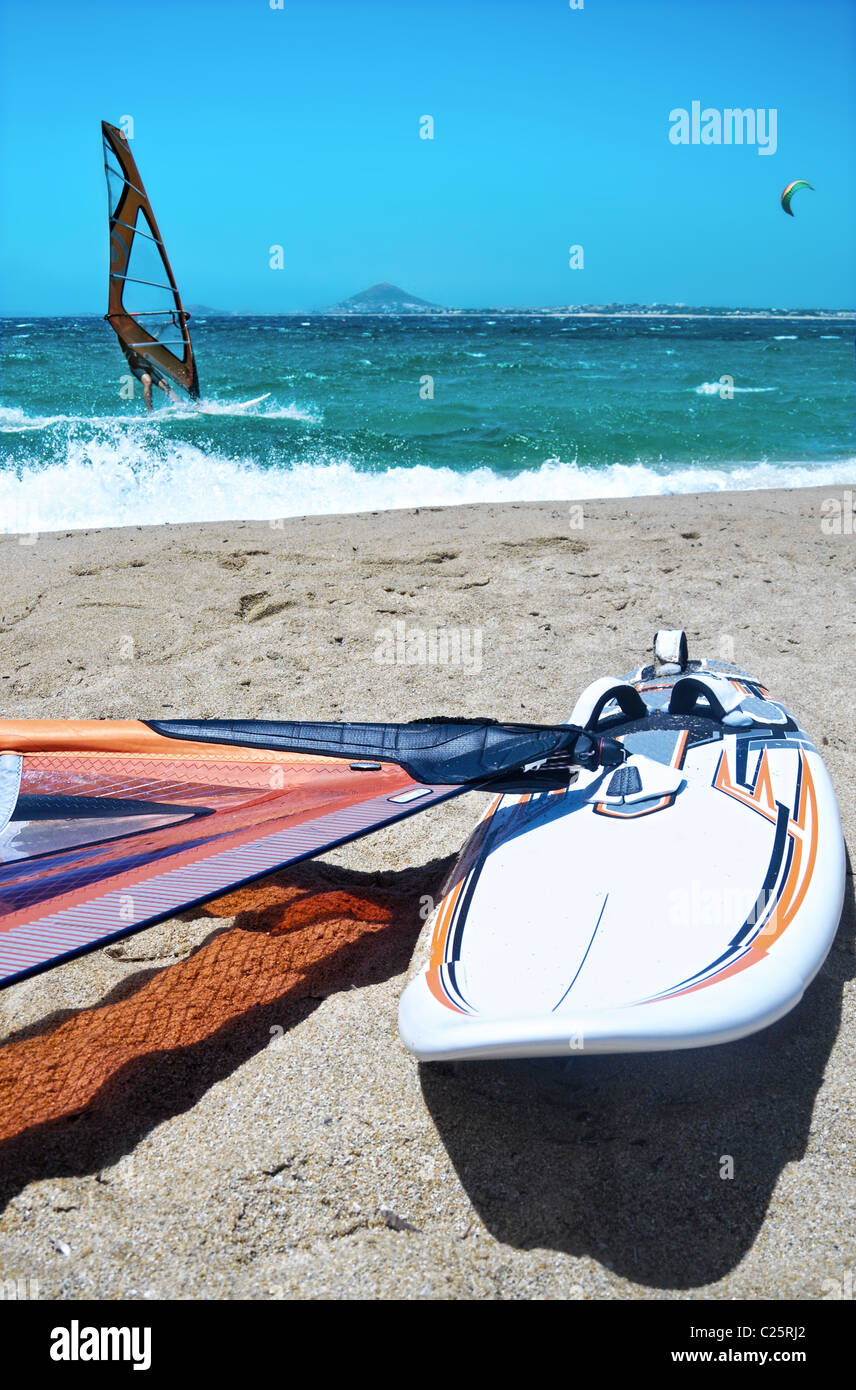 wind surf board lying on the beach Stock Photo - Alamy