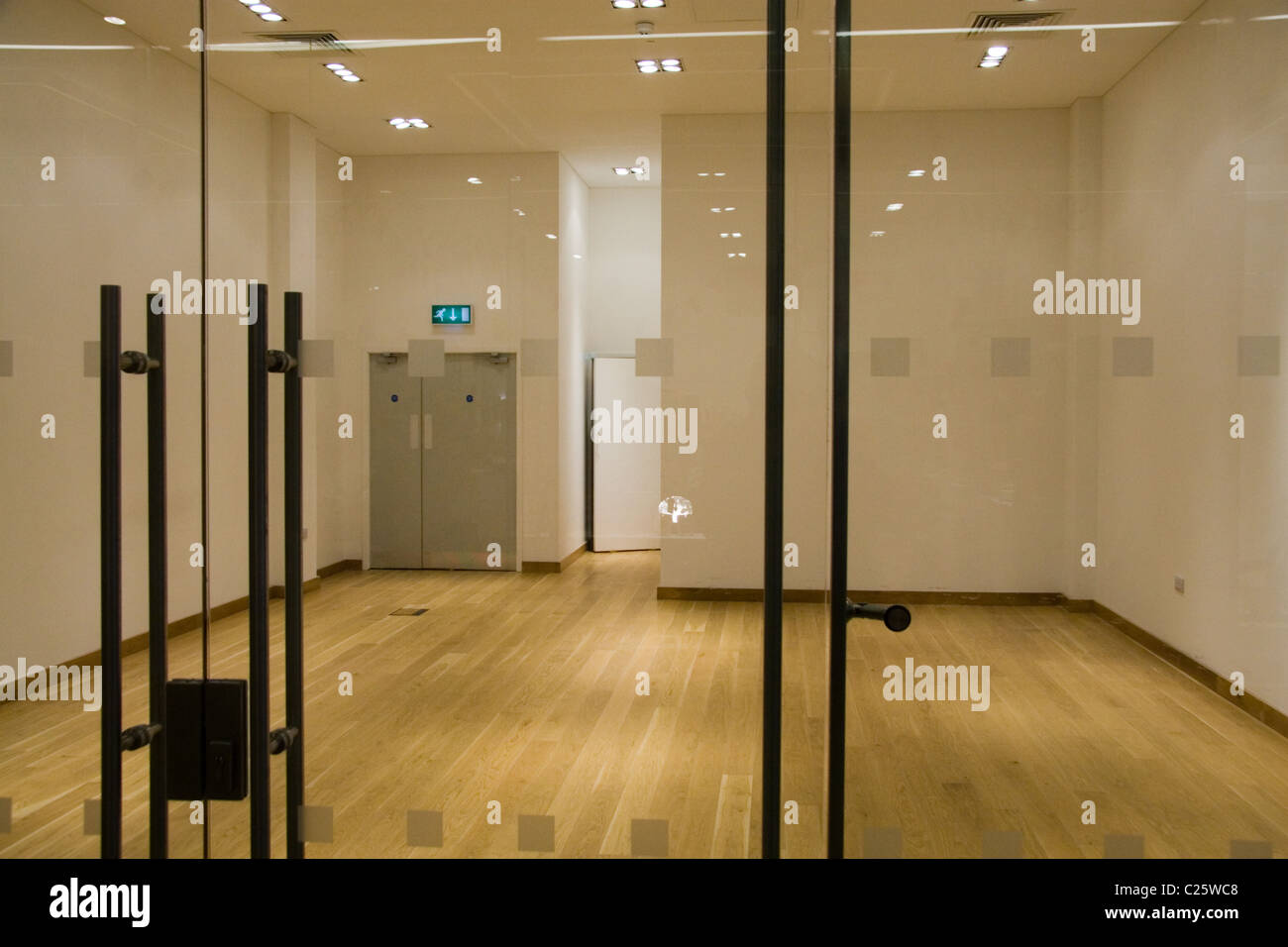 An empty shop space in a new urban shopping precinct Stock Photo - Alamy