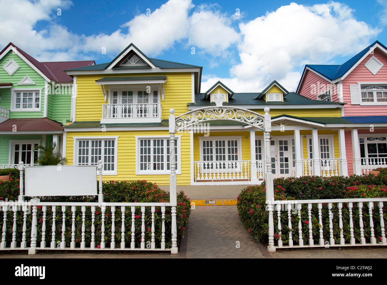 Wooden houses painted in Caribbean colors in Samana resort, Dominican ...